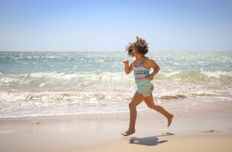 Summer fun on the beach. stock image. Image of exercise - 217098443