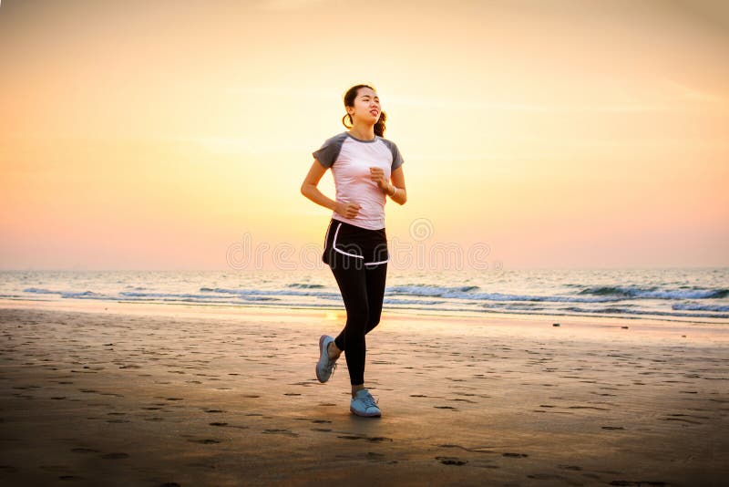 Girl Running on the Beach at Sunset Stock Photo - Image of active ...