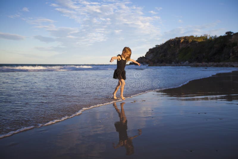 Girl Running on the Beach stock photo. Image of running - 30500104
