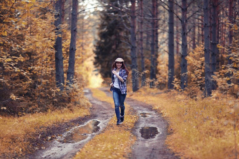 Girl running in forest stock image. Image of outdoors - 64112417