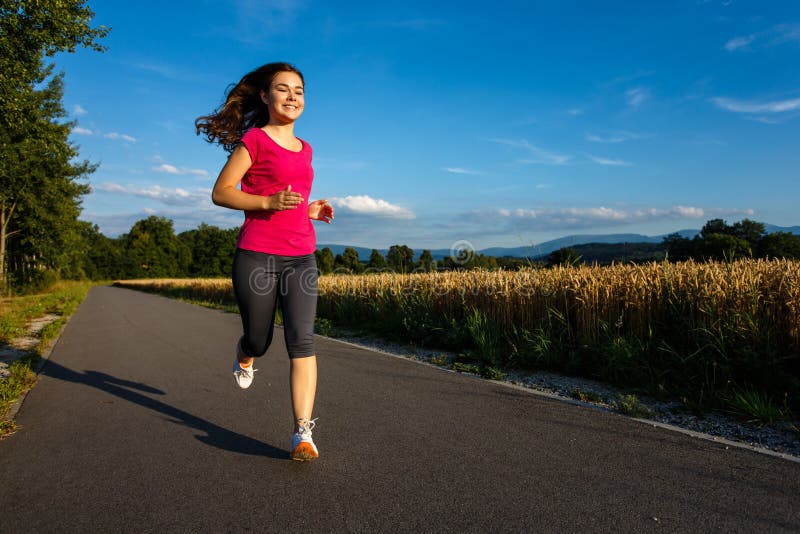 Girl running stock image. Image of blue, autumn, adolescent - 66126747