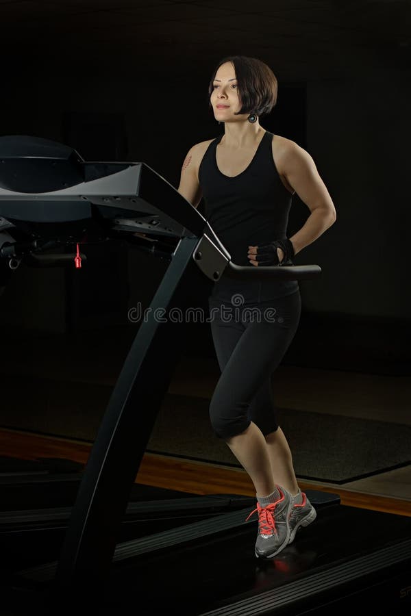 Girl on the Running Machine Stock Image - Image of training, running ...