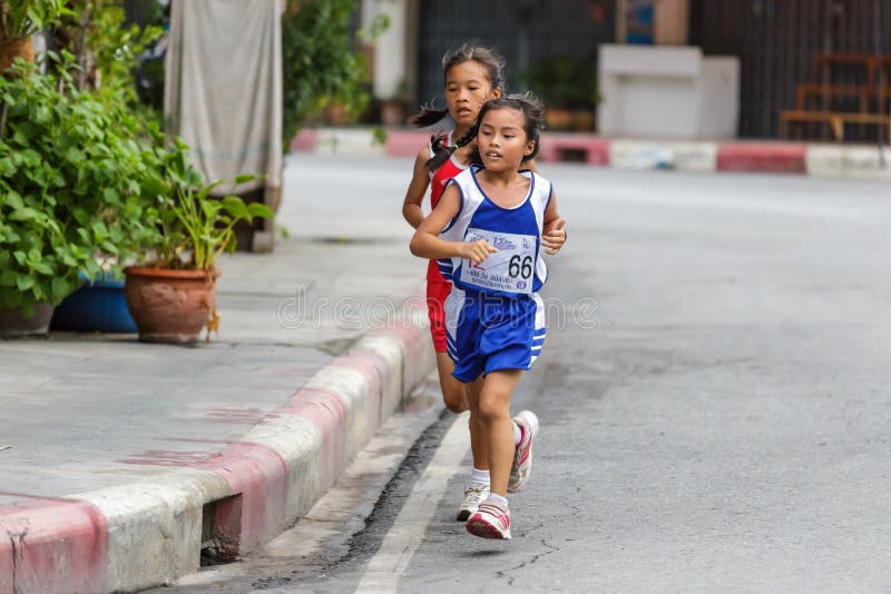 Girl is Running in Mini Marathon Editorial Image - Image of road, child ...