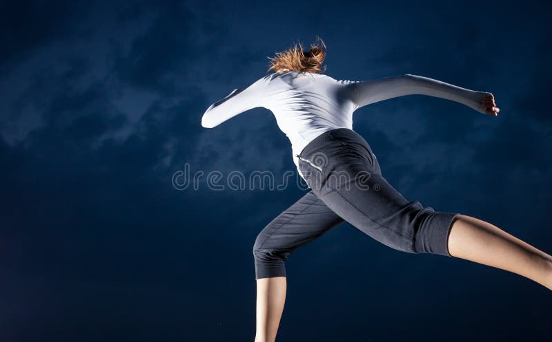 Girl running at night stock image. Image of active, marathon - 41082917