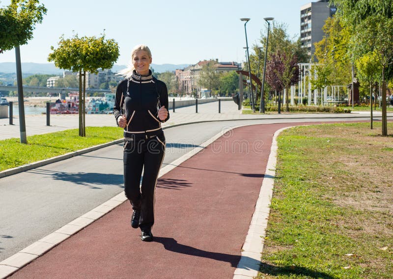Girl Running on the Road in the City Stock Photo - Image of fitness ...