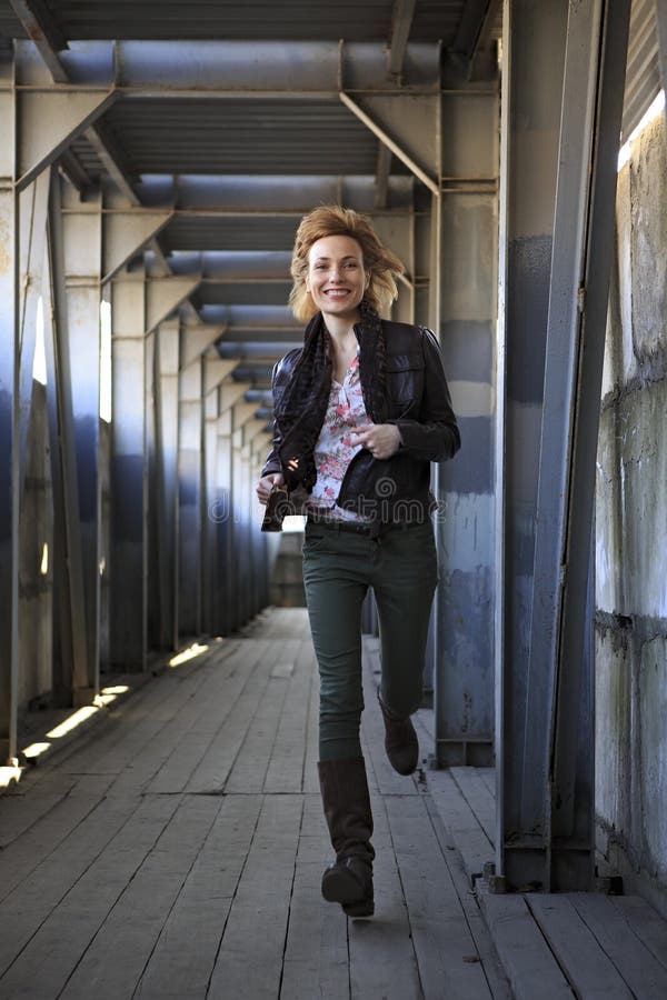 Girl Running through the Transition. Stock Photo - Image of behavior ...
