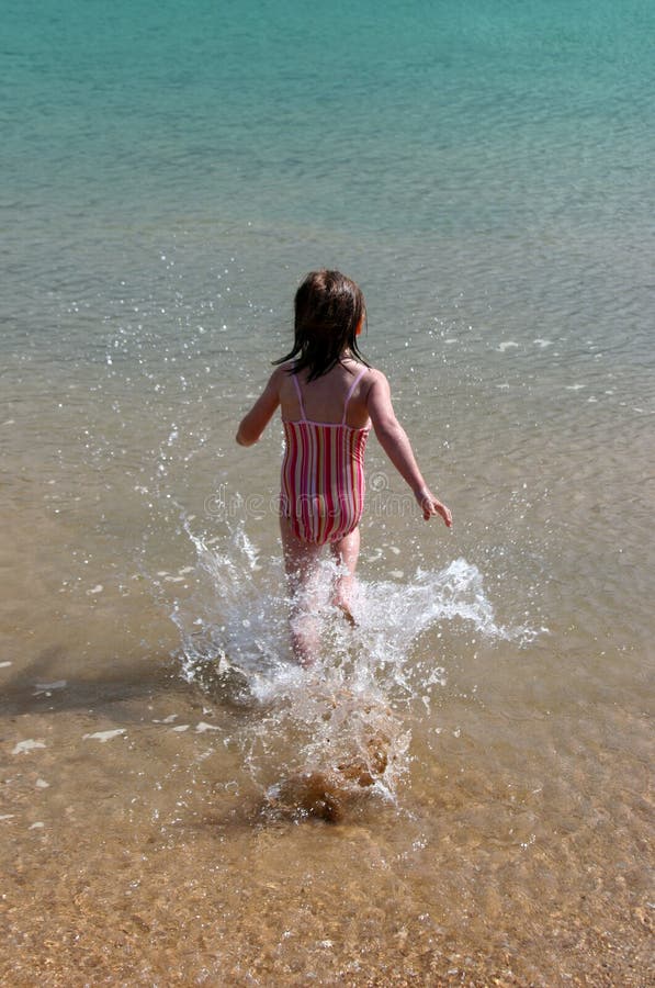 Girl Running into the Water Stock Photo - Image of white, sunny: 162414