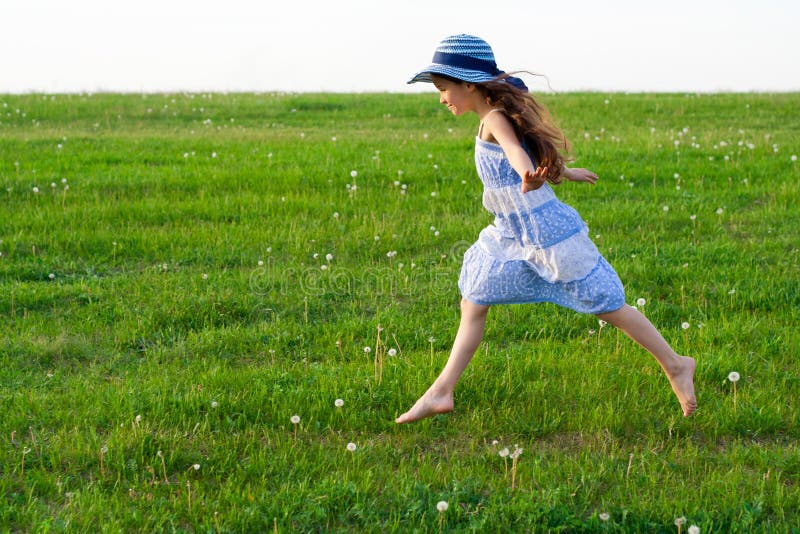 Little Girl Running Away in Meadow Stock Image - Image of natural, girl ...