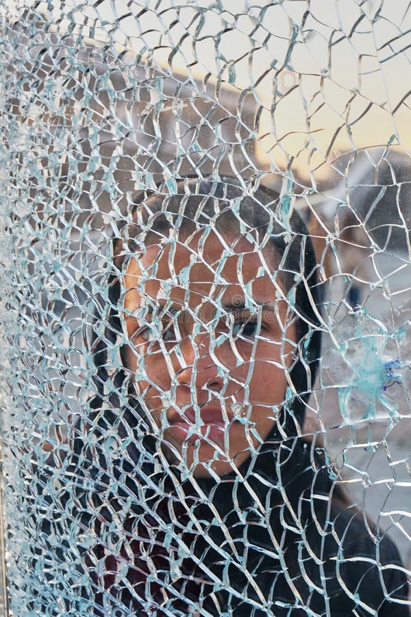 Woman Behind Broken Window Stock Photos - Free & Royalty-Free Stock ...