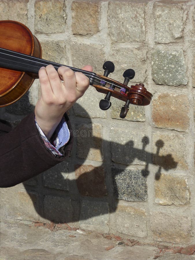 A Violin and its Shadow stock image. Image of table, strings - 59904275