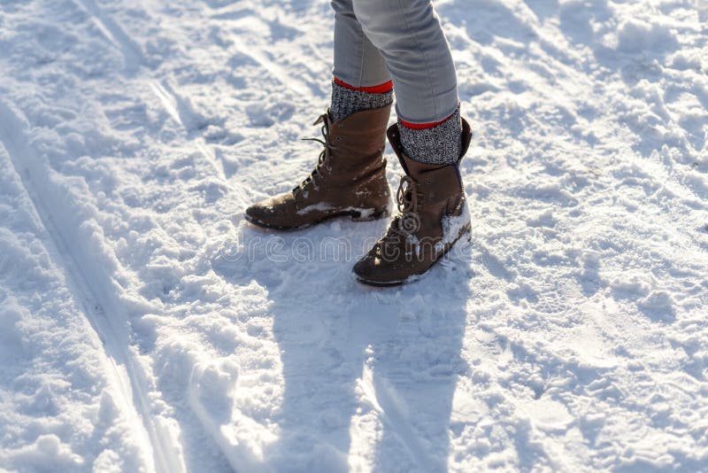 Girl s Legs in the Snow stock photo. Image of outdoor - 48627210
