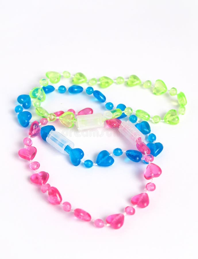 GirlÂ´s plastic bracelet stock photo. Image of bright - 4659170