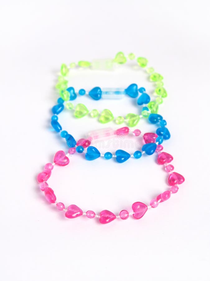 Pink plastic necklace stock photo. Image of bright, cian - 5211744