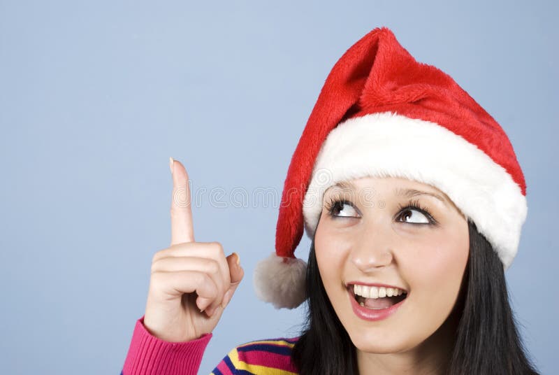Christmas Woman Wearing Santa Hat and Pointing Up Stock Image - Image ...