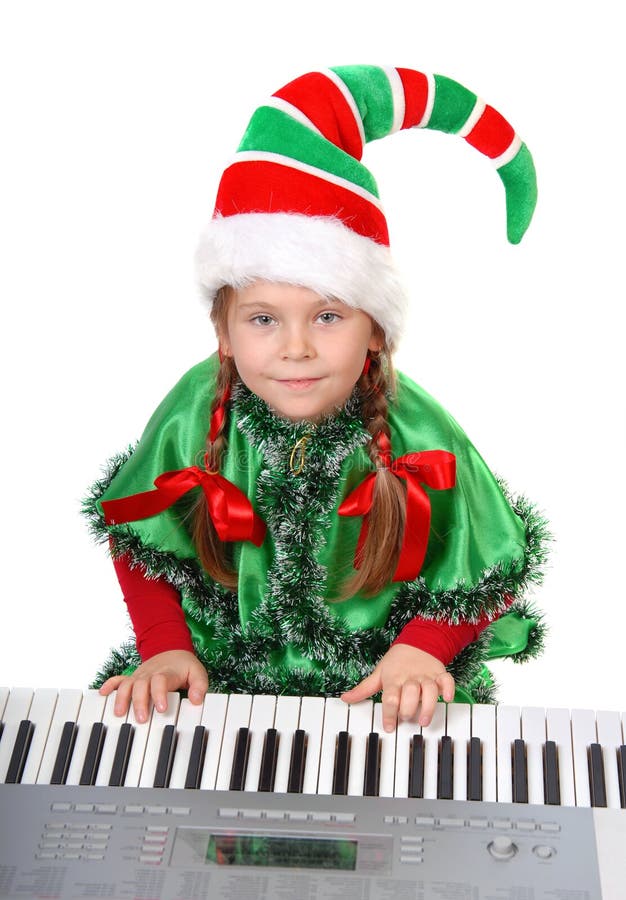Girl - Santa S Elf Plays a Synthesizer. Stock Photo - Image of octave ...