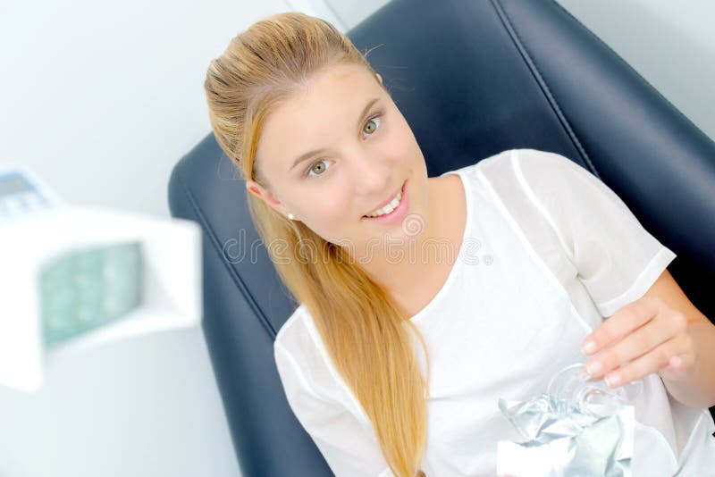 Girl sat in leather chair stock photo. Image of lady - 198671528
