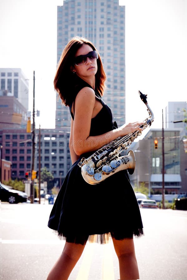 Girl with Sax in Street stock image. Image of black, attractive - 15492953