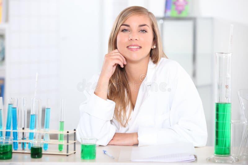 Girl in science lesson stock image. Image of coat, jacket - 26464275