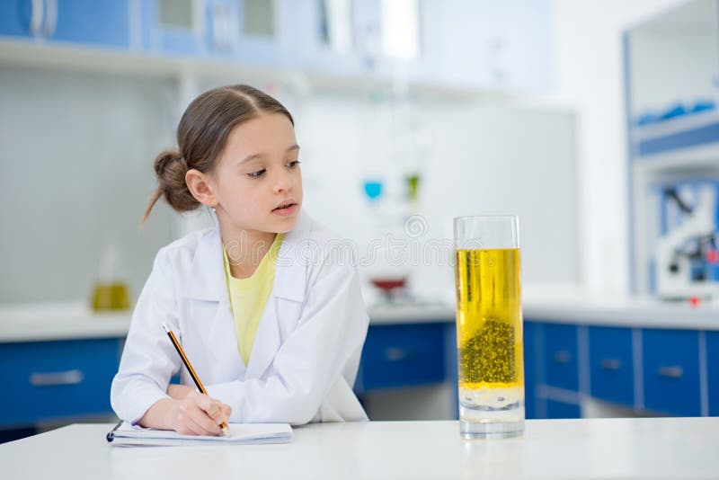 Girl Scientist Writing Down Results of Experiment in Lab Stock Image ...