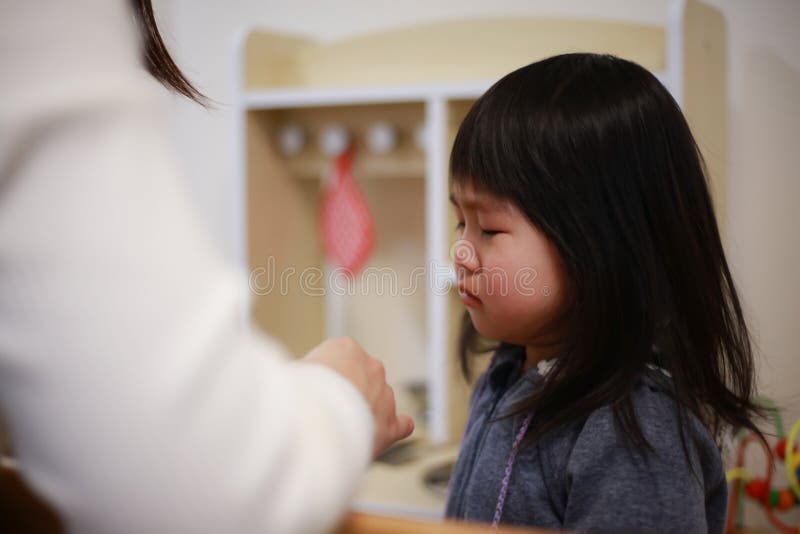 Girl scolded by her mother stock photo. Image of expression - 244101762