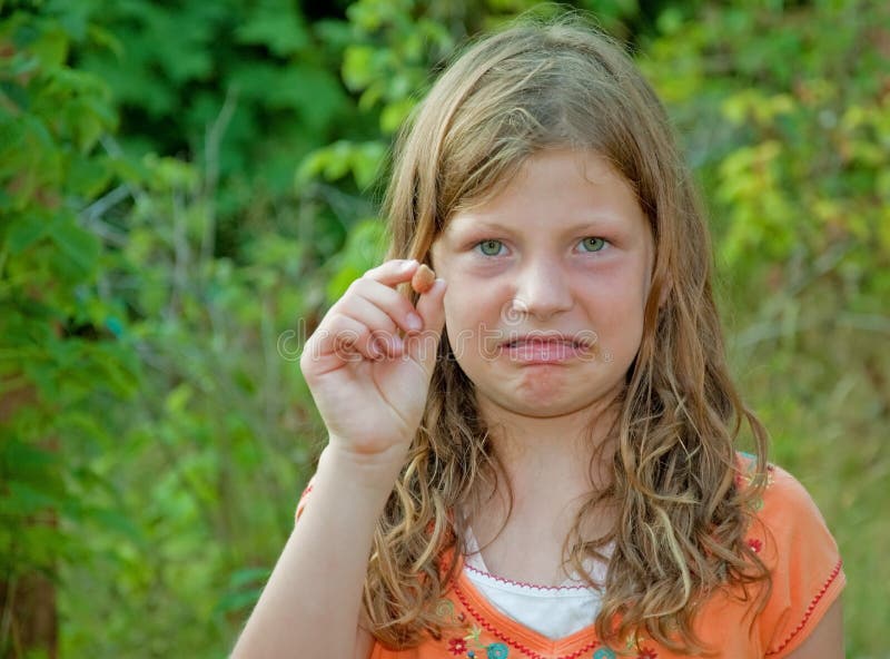 Girl Scowling at Rotton Raspberry Stock Photo - Image of raspberry ...