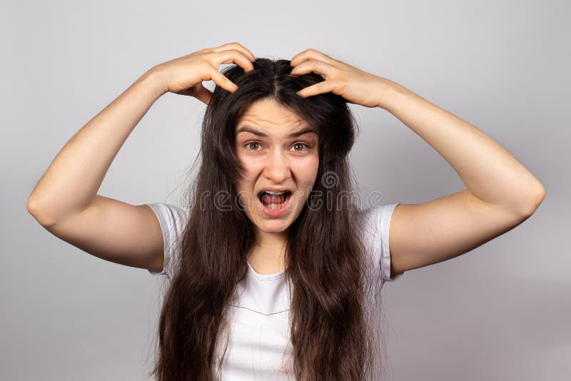 The Girl Scratches Her Head And Screams Lice In Hair Pediculosis