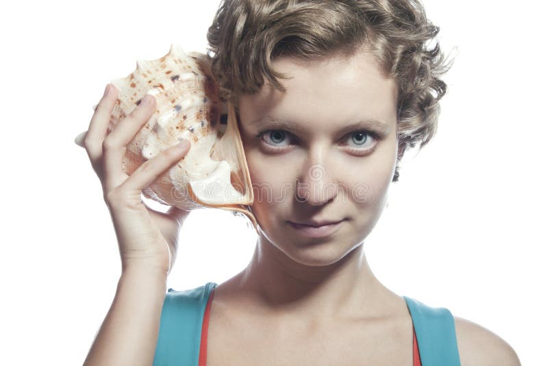 Girl with a Sea Shell To Your Ear Stock Photo - Image of person, woman ...