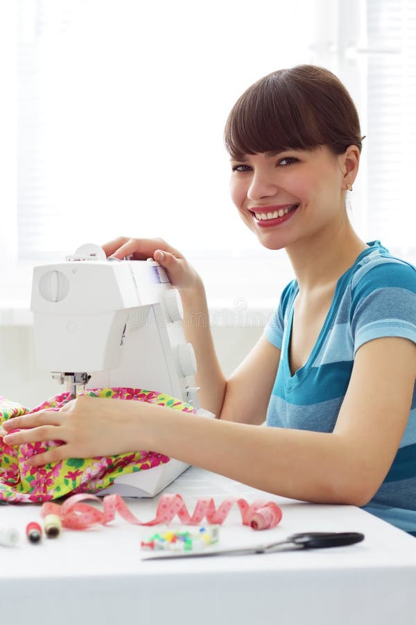 Girl Seamstress and Sewing Machine Stock Image - Image of device, light ...
