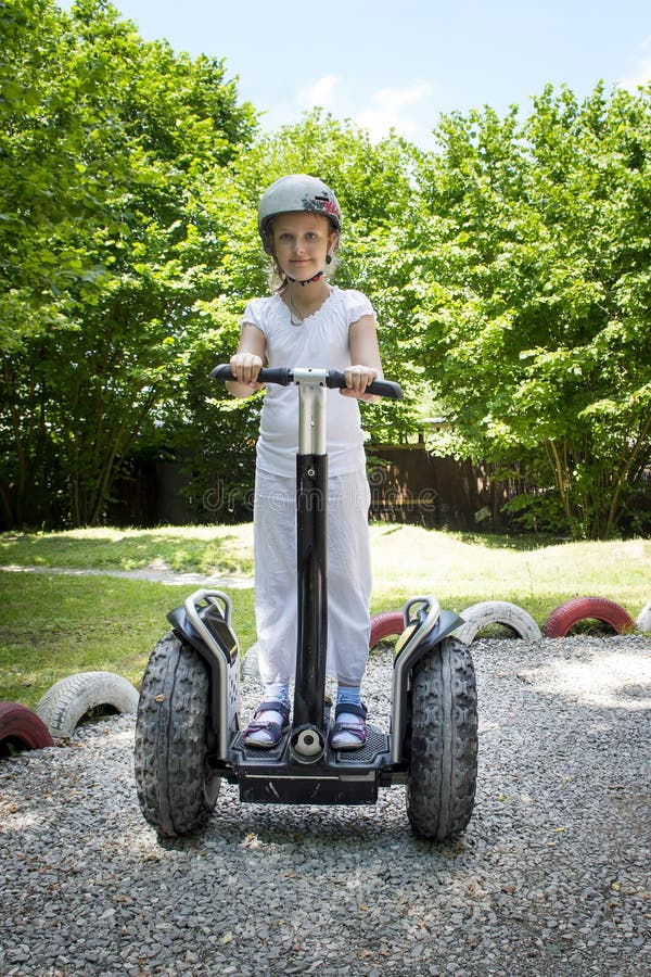 Happy Mature Lady Driving Segway Stock Image - Image of happiness ...
