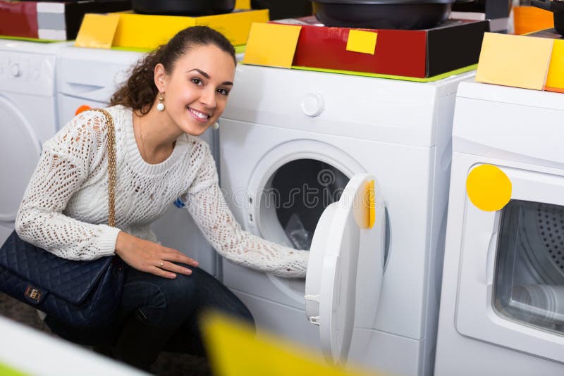 Girl Selecting New Washing Machine Stock Image - Image of girl, clients ...