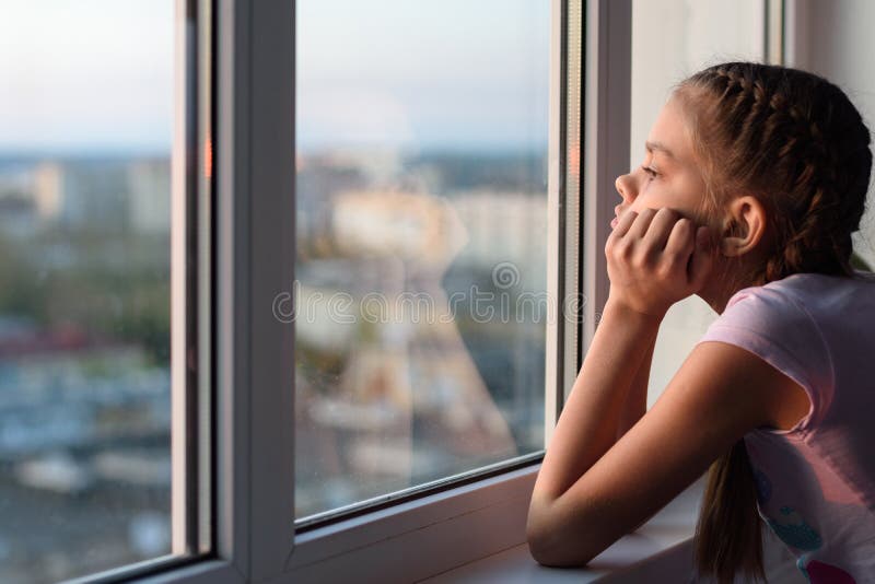 The Girl in Self-isolation Looks Out the Window Stock Image - Image of ...