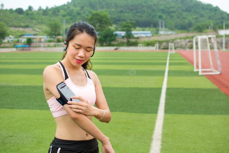 Girl Setting Modern Technology Equipment for Jogging Stock Photo ...