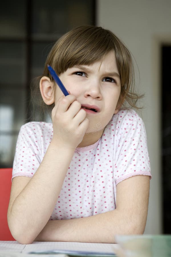 Girl Seven Years Old Doing Homework. Stock Photo - Image of thoughful ...