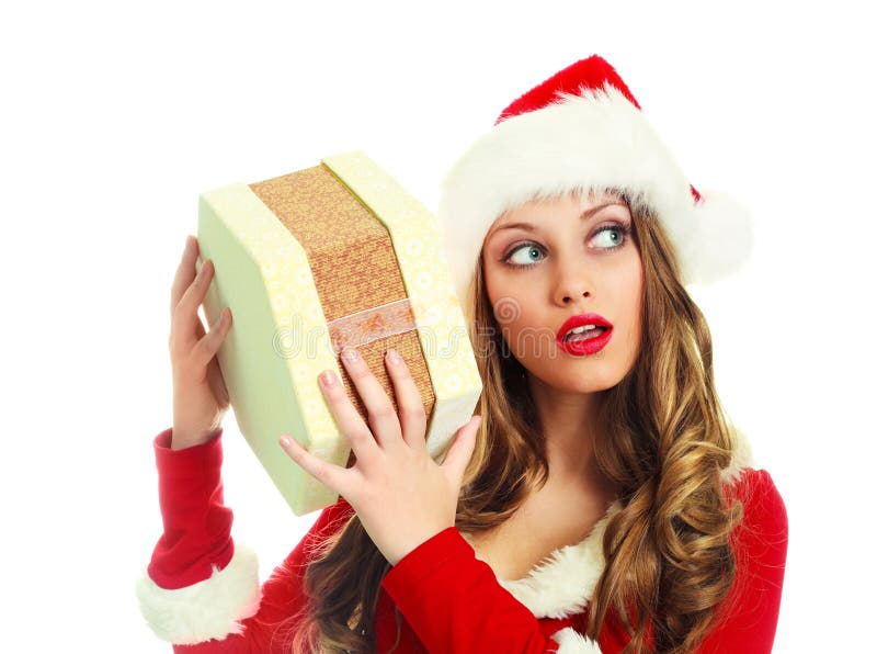 Girl Shaking a Christmas Present Stock Photo - Image of beauty, lips ...