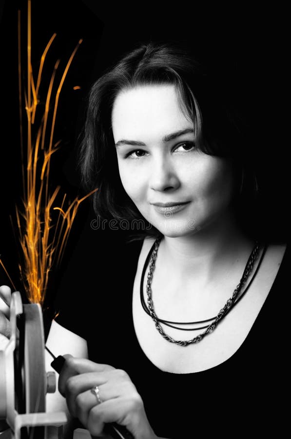 The Girl Sharpens A Knife Picture. Image: 4588441