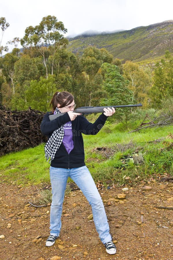 Woman Shooting stock photo. Image of sport, young, shoot - 5738364