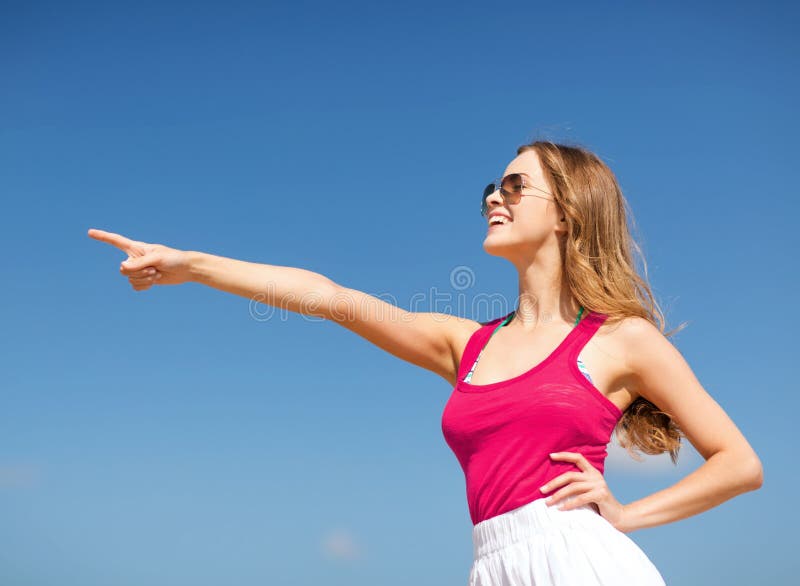 Girl Showing Direction on the Beach Stock Image - Image of resort ...