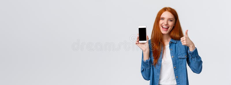 Girl Showing Friend Cool New Mobile Game Attractive Cheerful Redhead