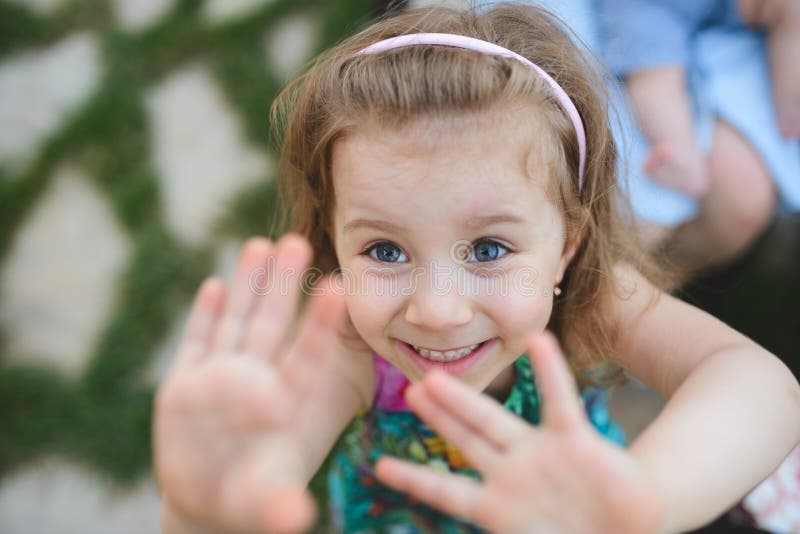 Girl Showing Palms stock photo. Image of ethnicity, nature - 84738772