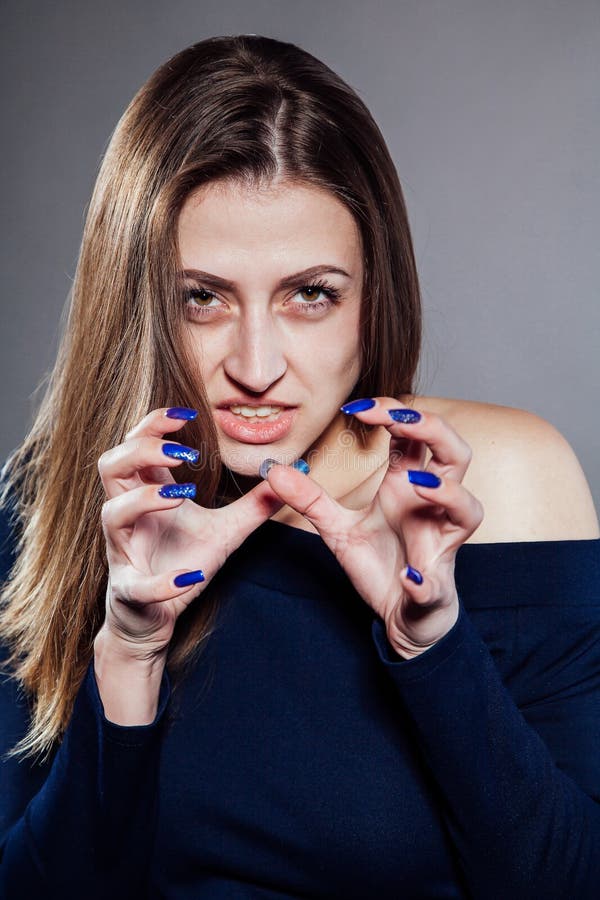 Beautiful Girl Shows Emotions and Angry in the Studio Stock Photo ...