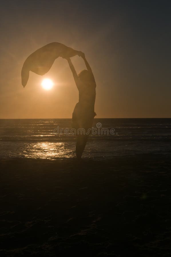 Girl Silhouette Against Sunset Stock Image - Image of wave, sunset ...