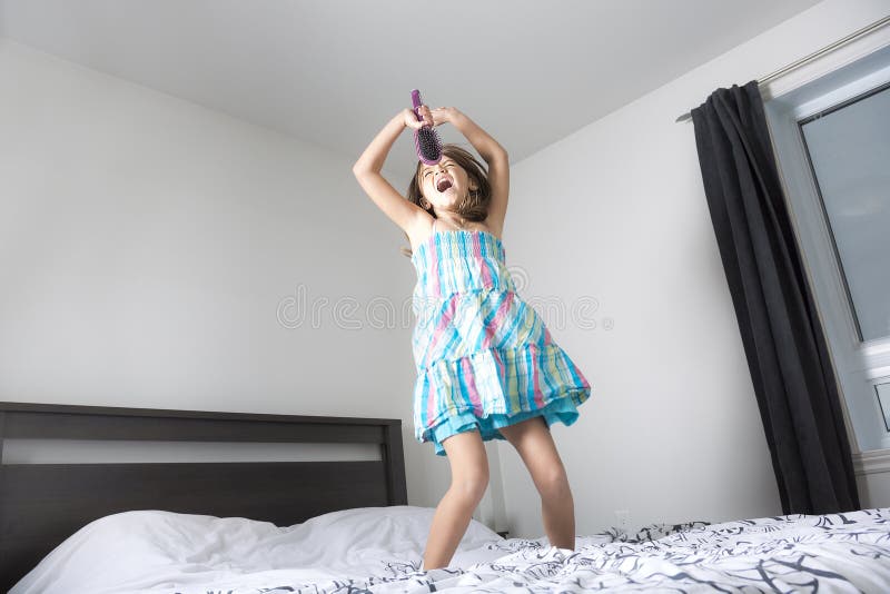 Girl singer in the bedroom stock image. Image of ladies - 74570731