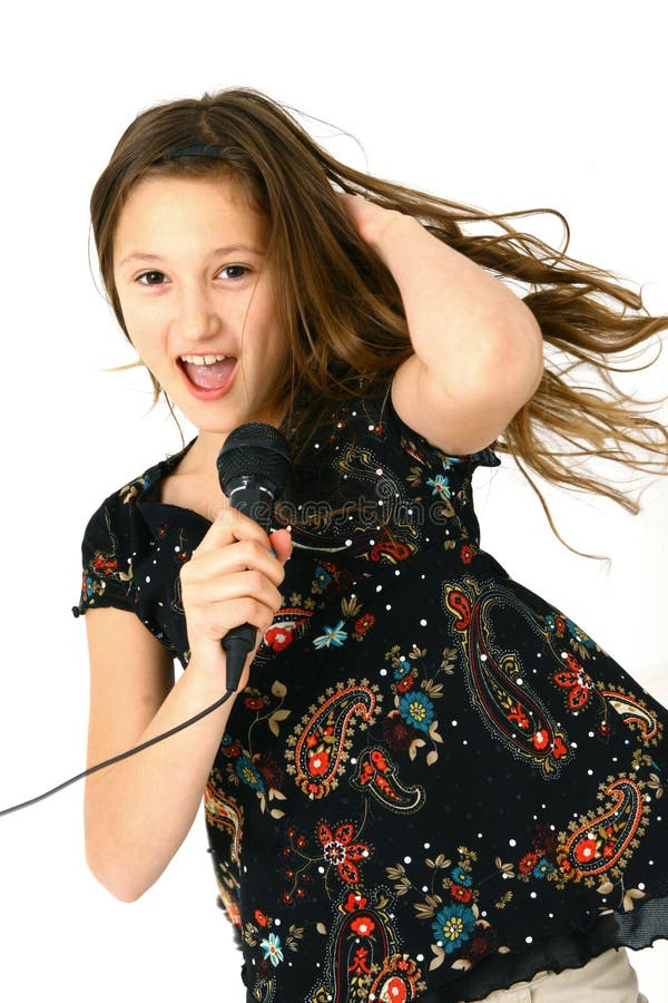 Girl Singing into Microphone Stock Image - Image of performs, girl: 7318009
