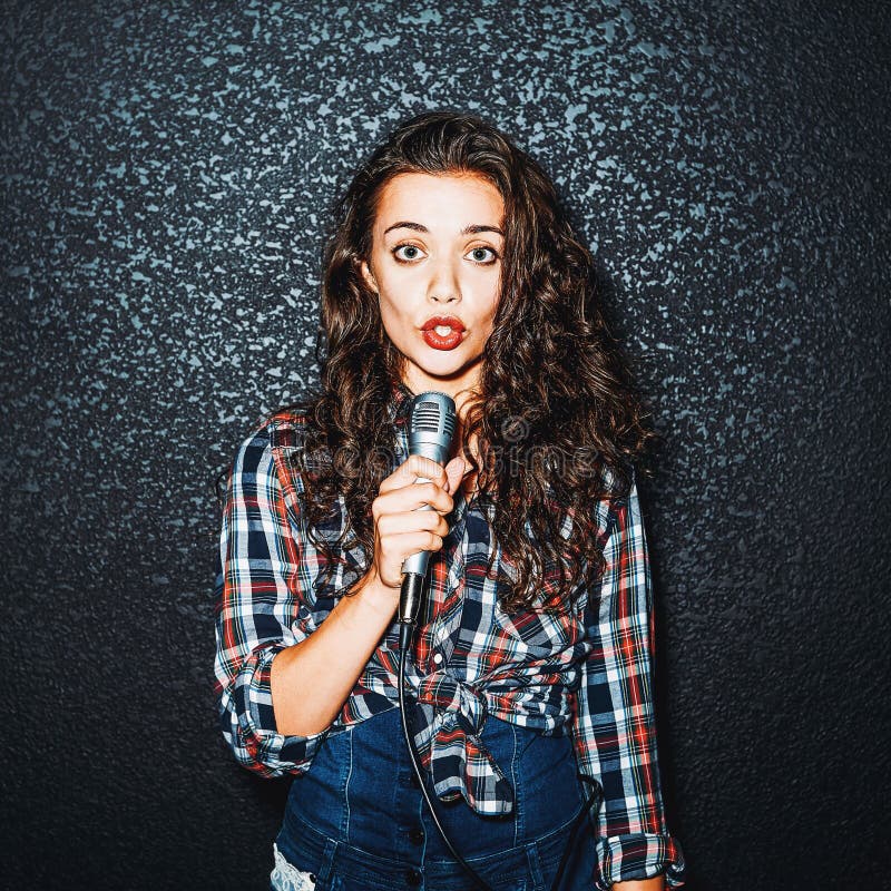 Girl Singing with Microphone Stock Photo - Image of portrait, girl ...
