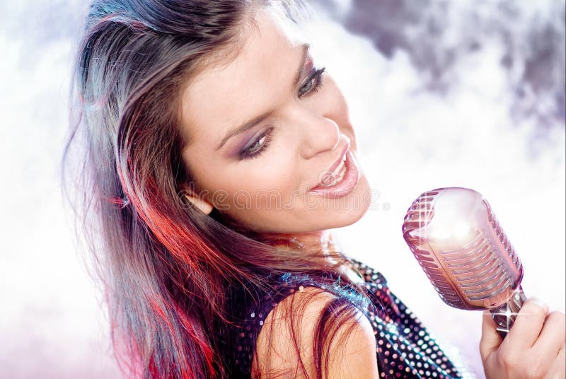 Girl singing in retro mic stock photo. Image of rocker - 6504258