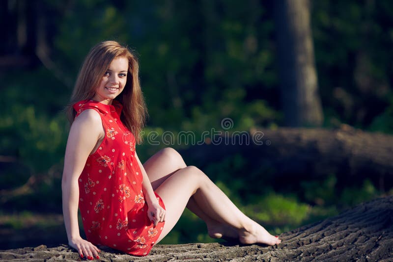 Girl siting on a log stock photo. Image of pensive, nature - 30809046