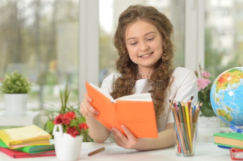Girl Siting at Table Studying, Doing Home Work Stock Photo - Image of ...