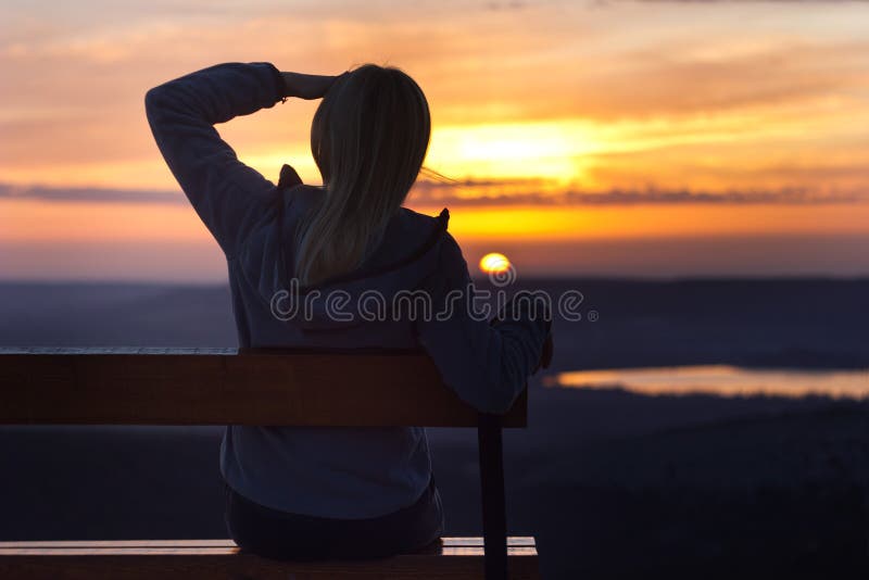 Girl Sitting on a Banch at Sunset Stock Image - Image of girl, meditate ...