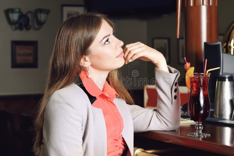 Girl sitting at the bar stock photo. Image of adult, female - 42325868