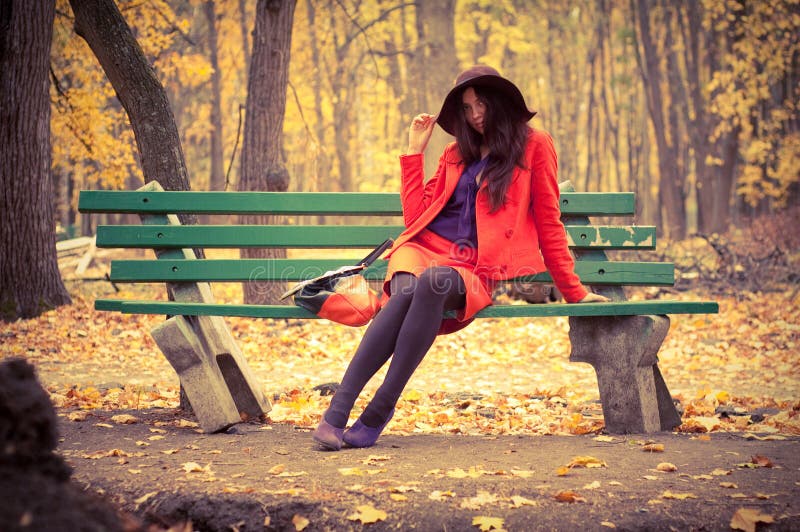 Girl sitting on bench stock image. Image of portrait - 22030609
